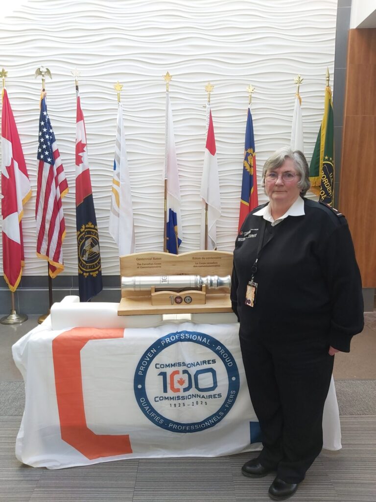 The Centennial Baton and Flag at Commissionaires Hamilton – Commissionaires